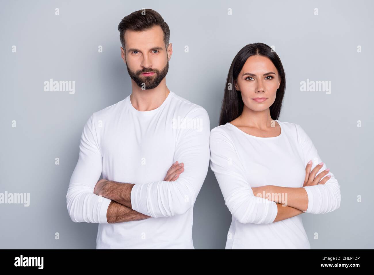 Photo of charming confident young brother sister dressed white shirts ...