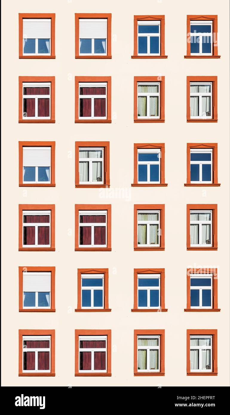 facade of house with four windows in detail Stock Photo - Alamy