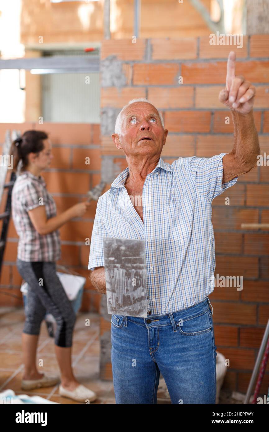 Retired man looking construction hi-res stock photography and images ...