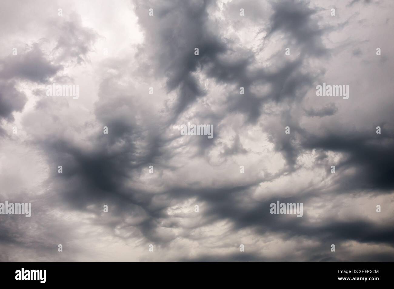 Cloudy dramatic mountain sky before storm Stock Photo - Alamy