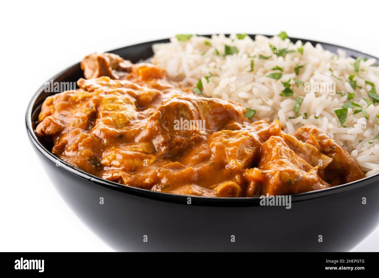 Indian butter chicken isolated on white background Stock Photo - Alamy