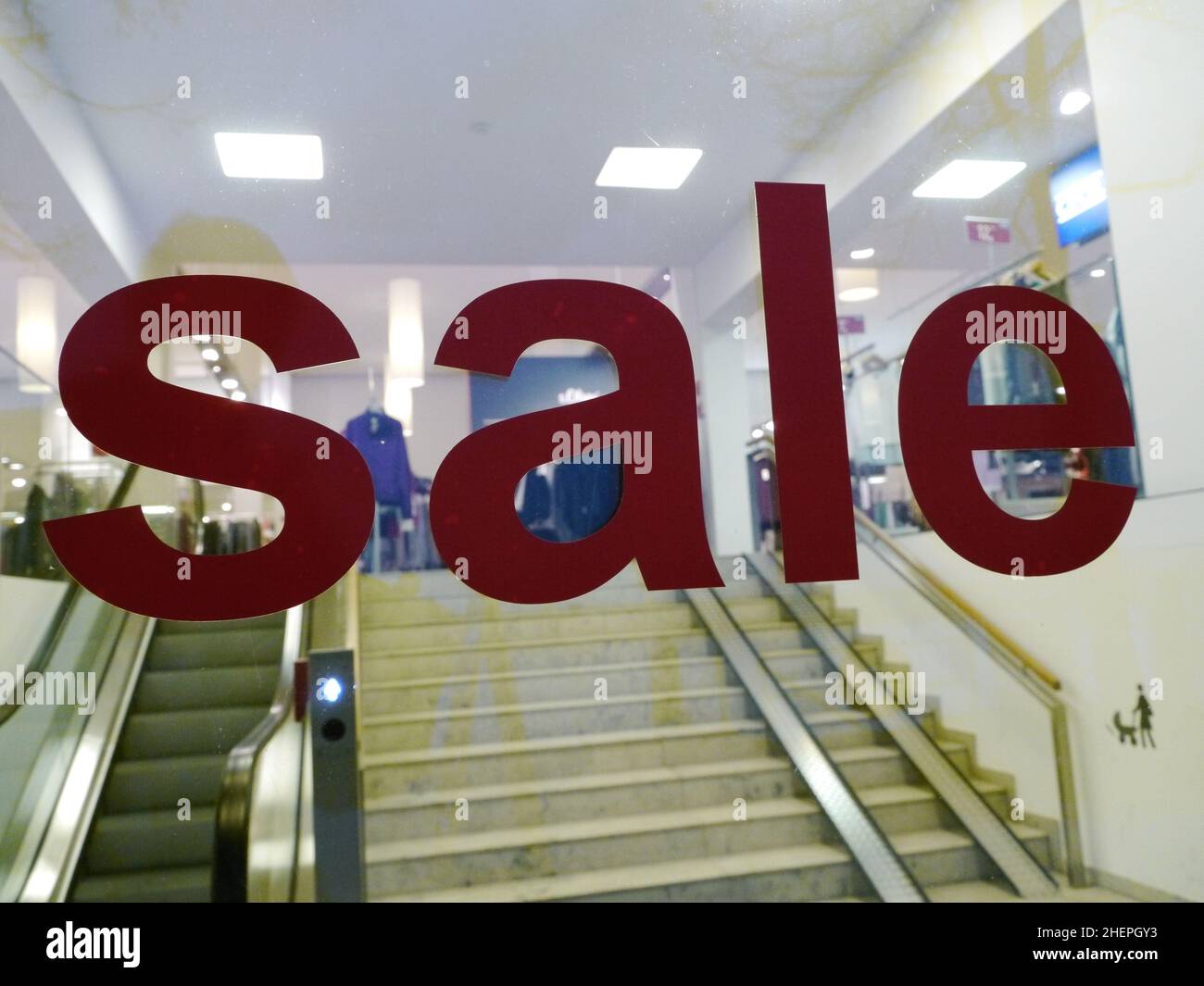 sale text on shopping window Stock Photo - Alamy