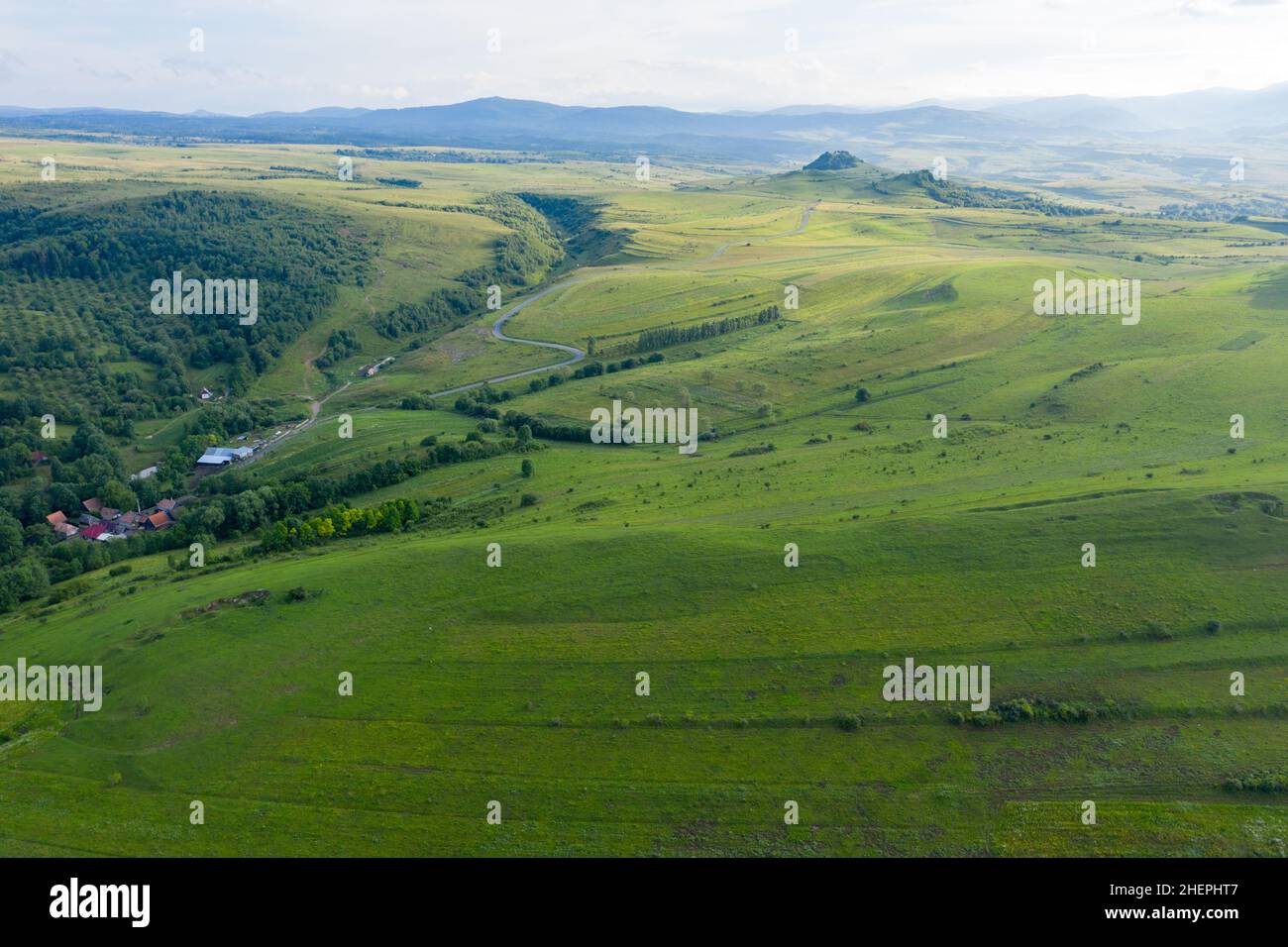 Aerial view of countryside vibrant green hills. Transylvania, Romania ...