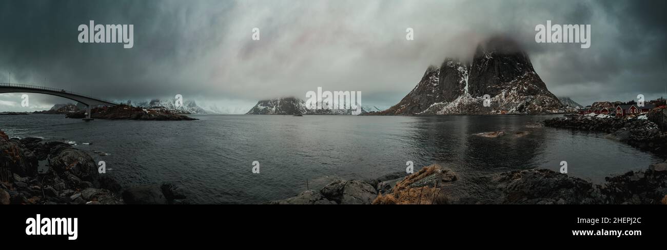 Norwegian fjords in spring and mountains at low clouds panorama Stock ...