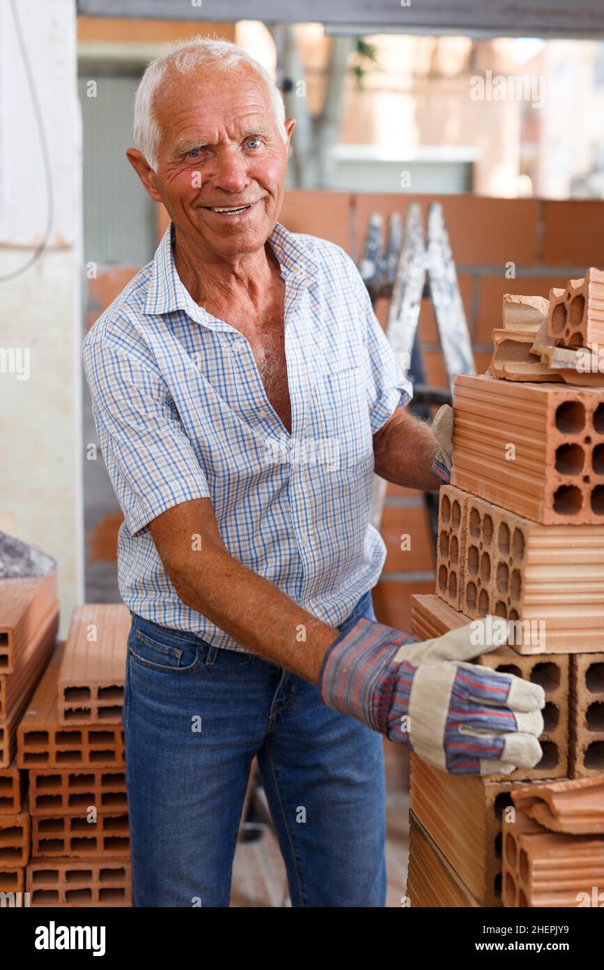 Mason examining hi-res stock photography and images - Alamy