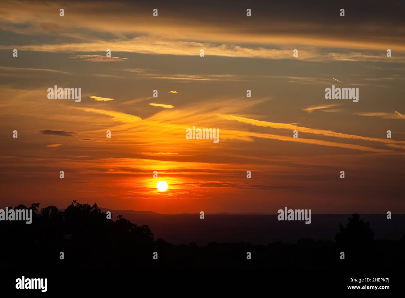 Beautiful sunset coloured sky with dramatic clouds Stock Photo - Alamy