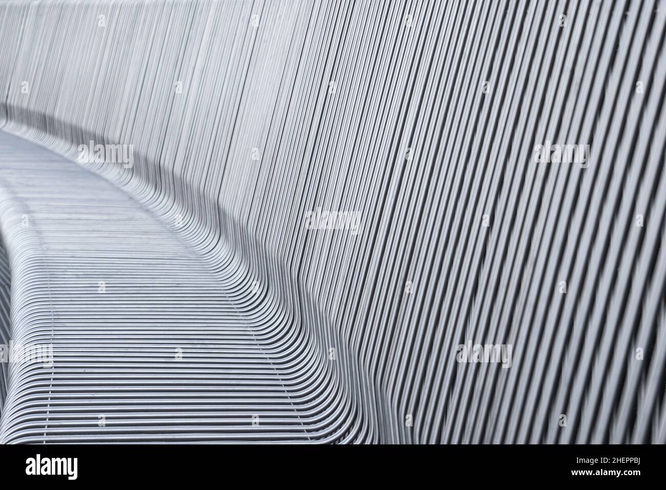 Rows of even metal strips close-up. Part of a metal item with rows of ...