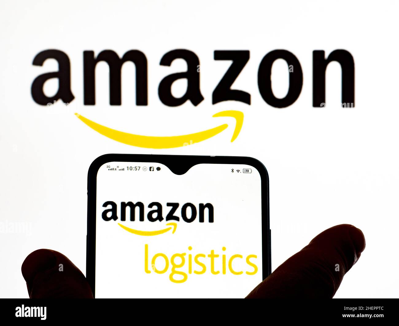 In this photo illustration, the Amazon Logistics logo is seen displayed ...