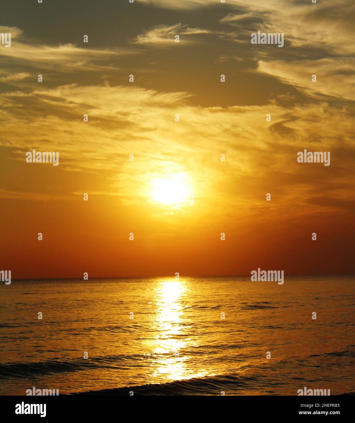 Sunset view at beach Stock Photo - Alamy