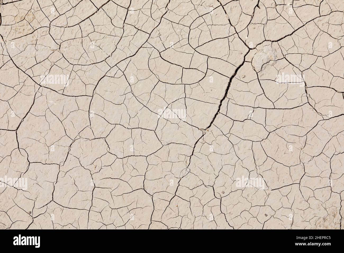 pattern of dried and cracked soil in the death valley Stock Photo - Alamy