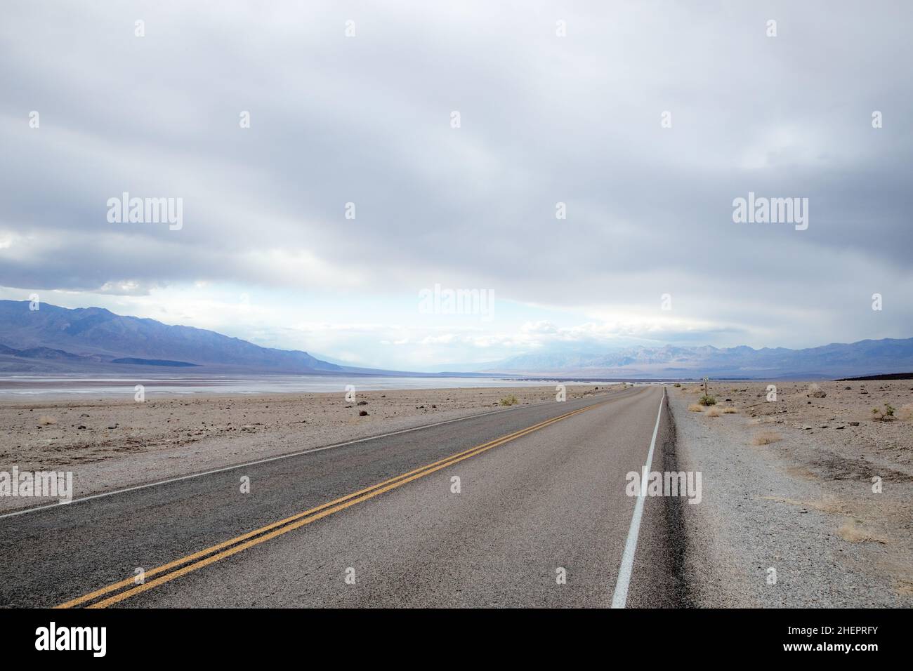 travelling in the death valley desert on empty road Stock Photo - Alamy