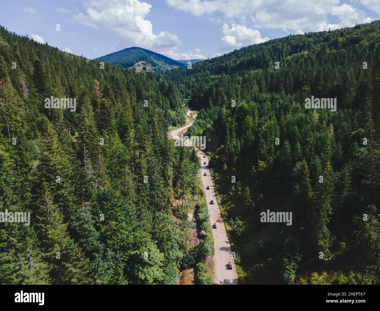 aerial view of quad bike riders at mountain trail road copy space Stock ...