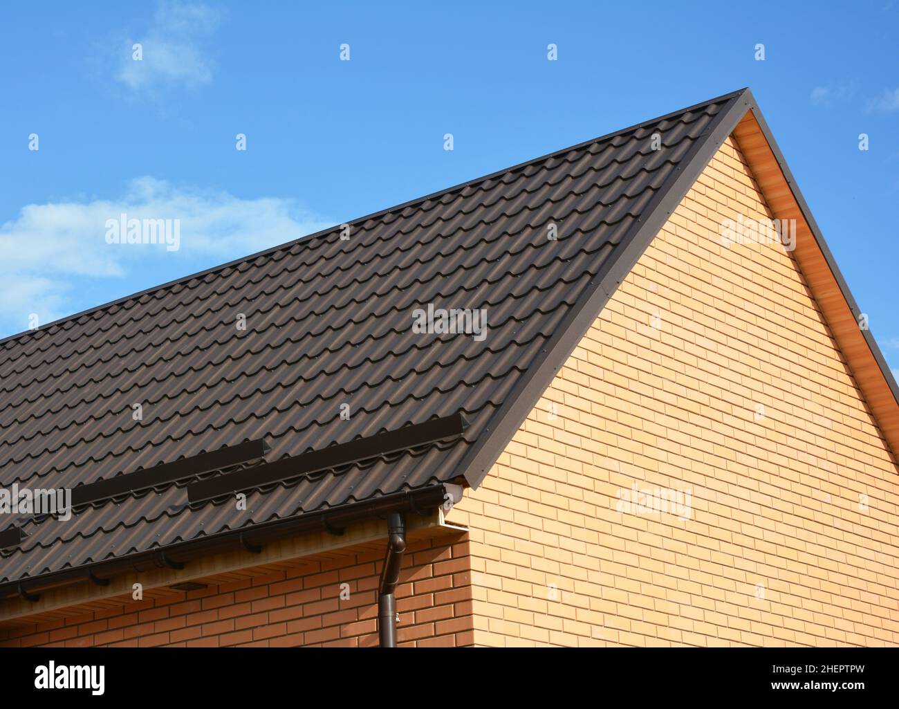 Close up on Roof Snow Guards. Metal roof snow guards prevent the ...