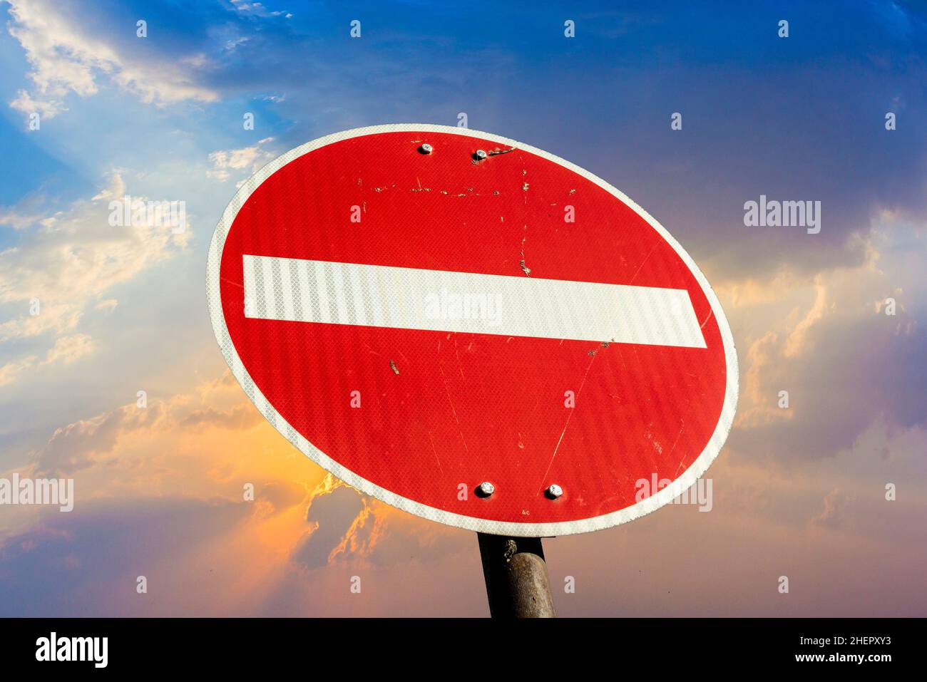 red traffic sign one way street under blue sky Stock Photo - Alamy
