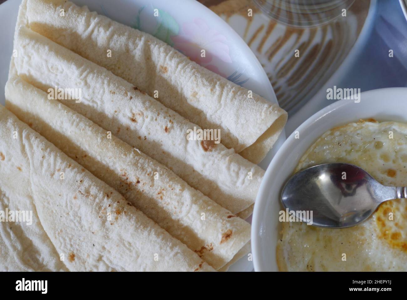 homemade roti chapati and egg on table, top view Stock Photo - Alamy