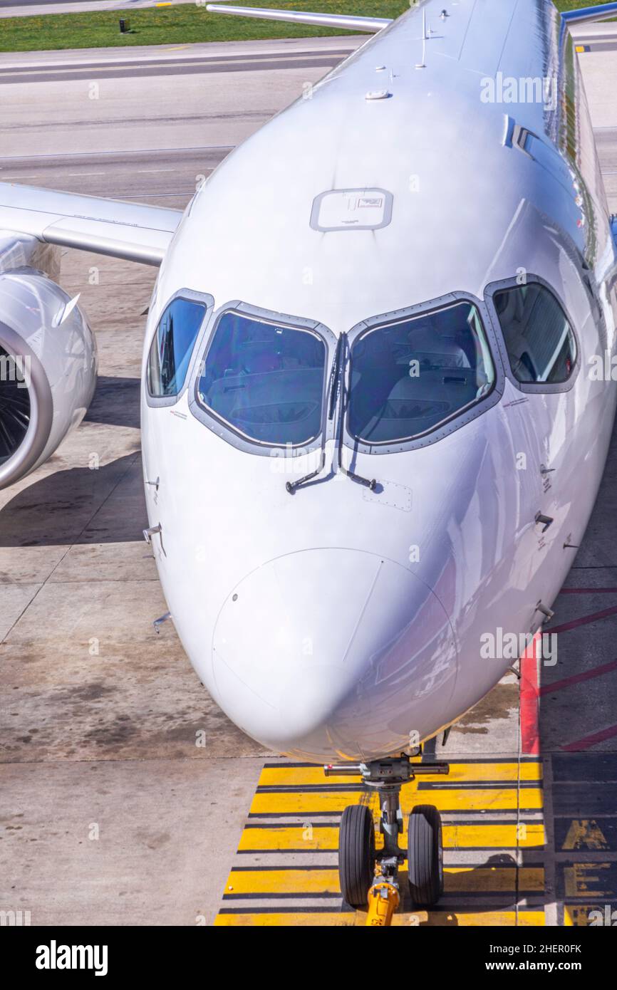 neutral aircraft with cockpit view at the gate at the airport Stock ...