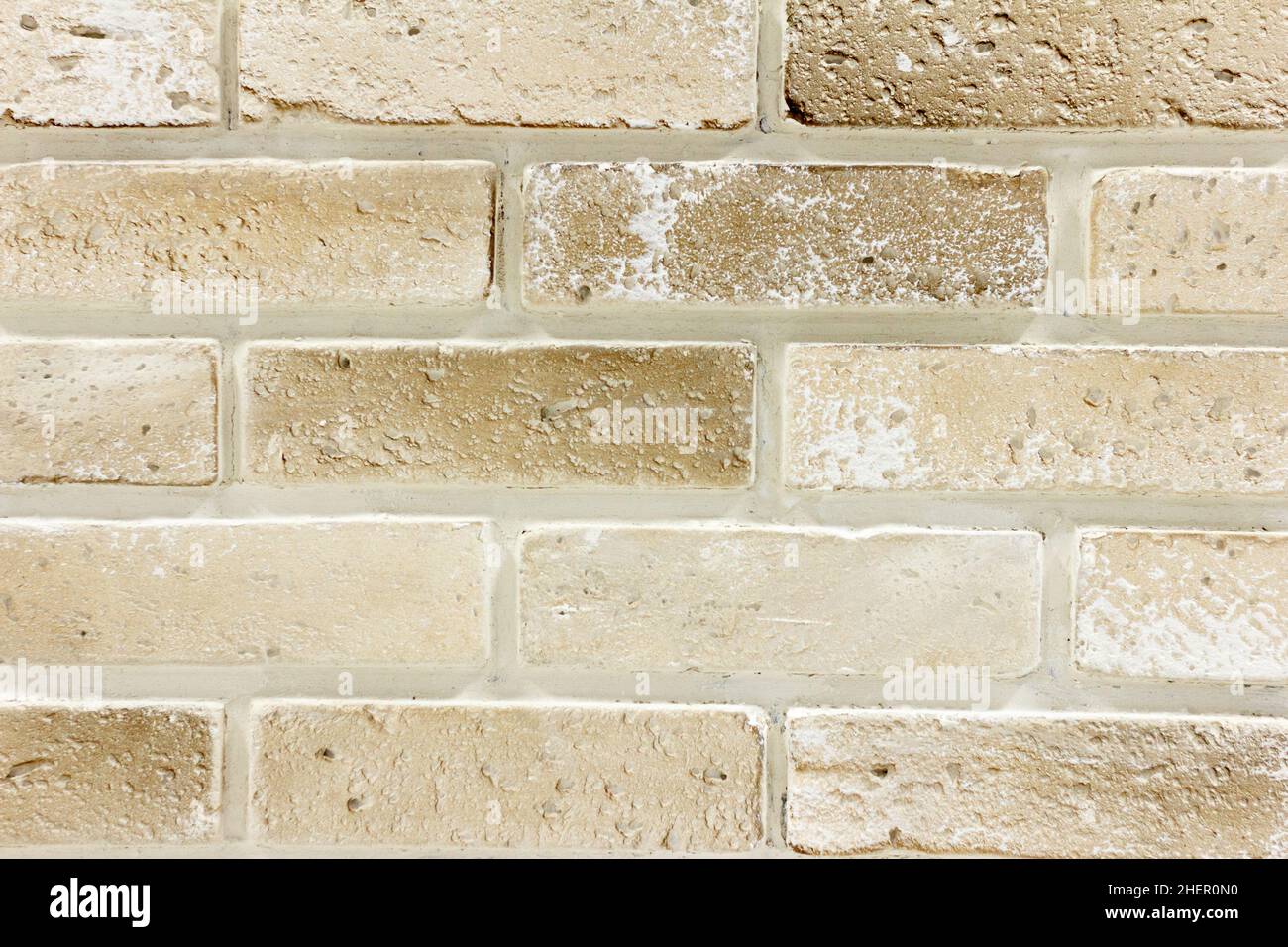 Light brown Ornamental brick wall forms part of interior in house ...