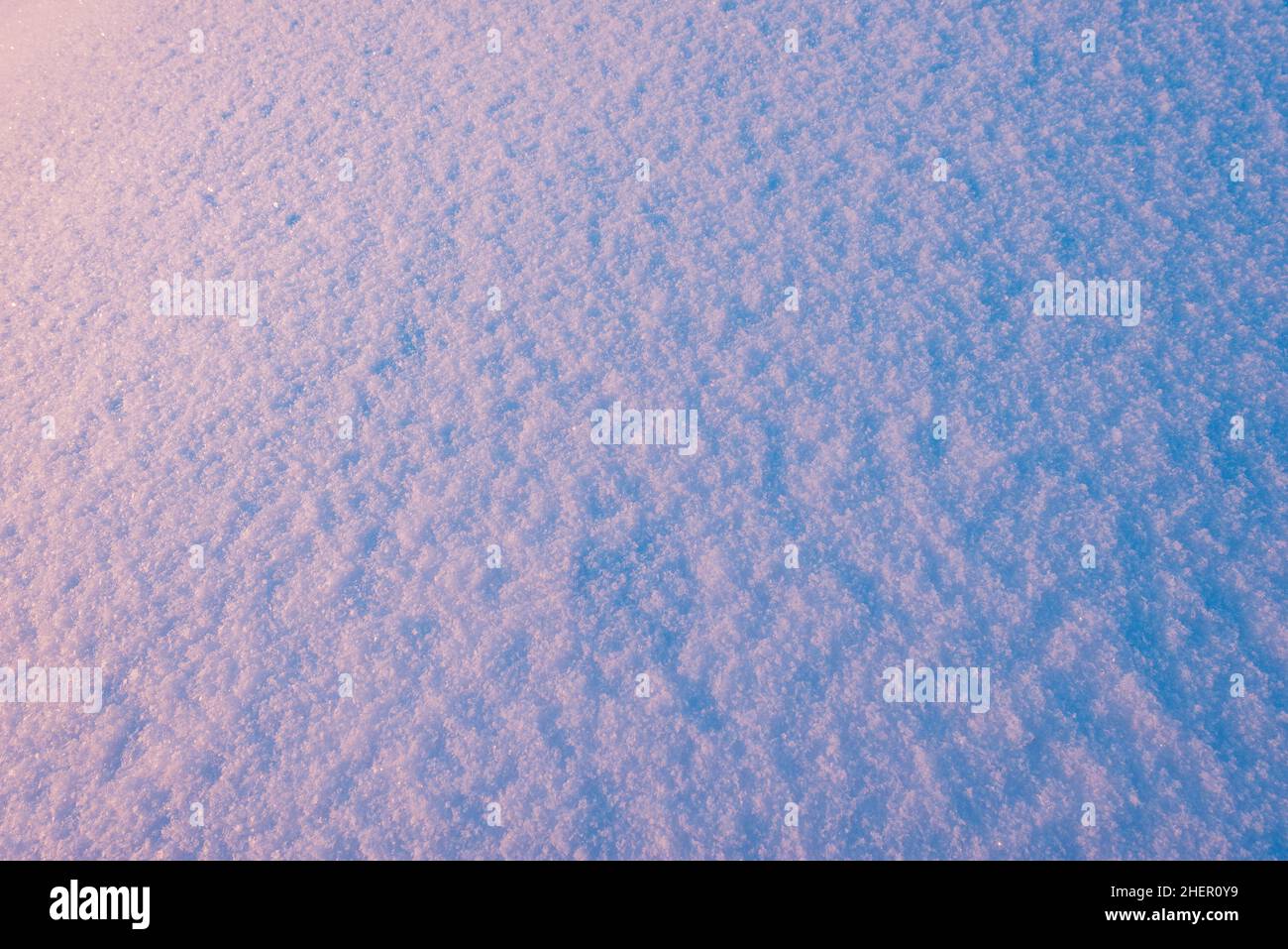 Surface of snowdrift at winter sunset time Stock Photo - Alamy