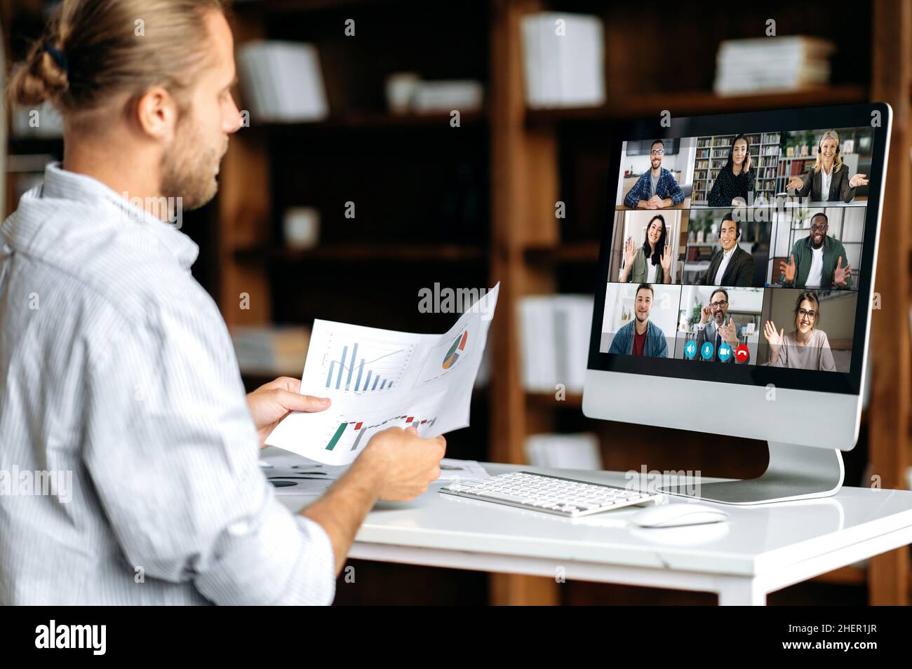 Virtual business meeting, online discuss. Side view of a corporate ...