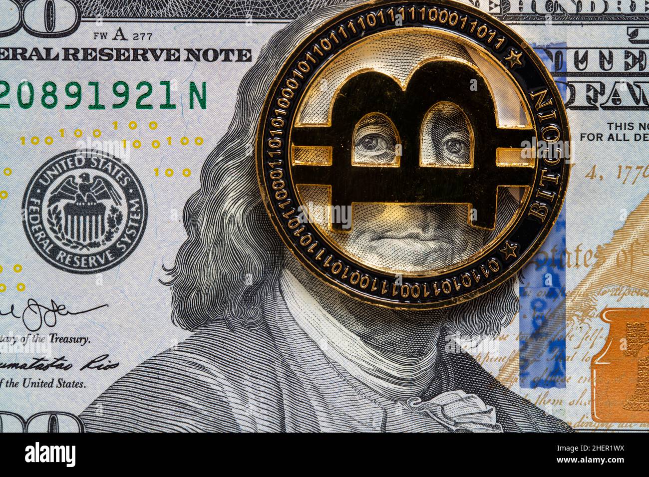 Bitcoin on 100 dollar bill background for design purpose Stock Photo ...