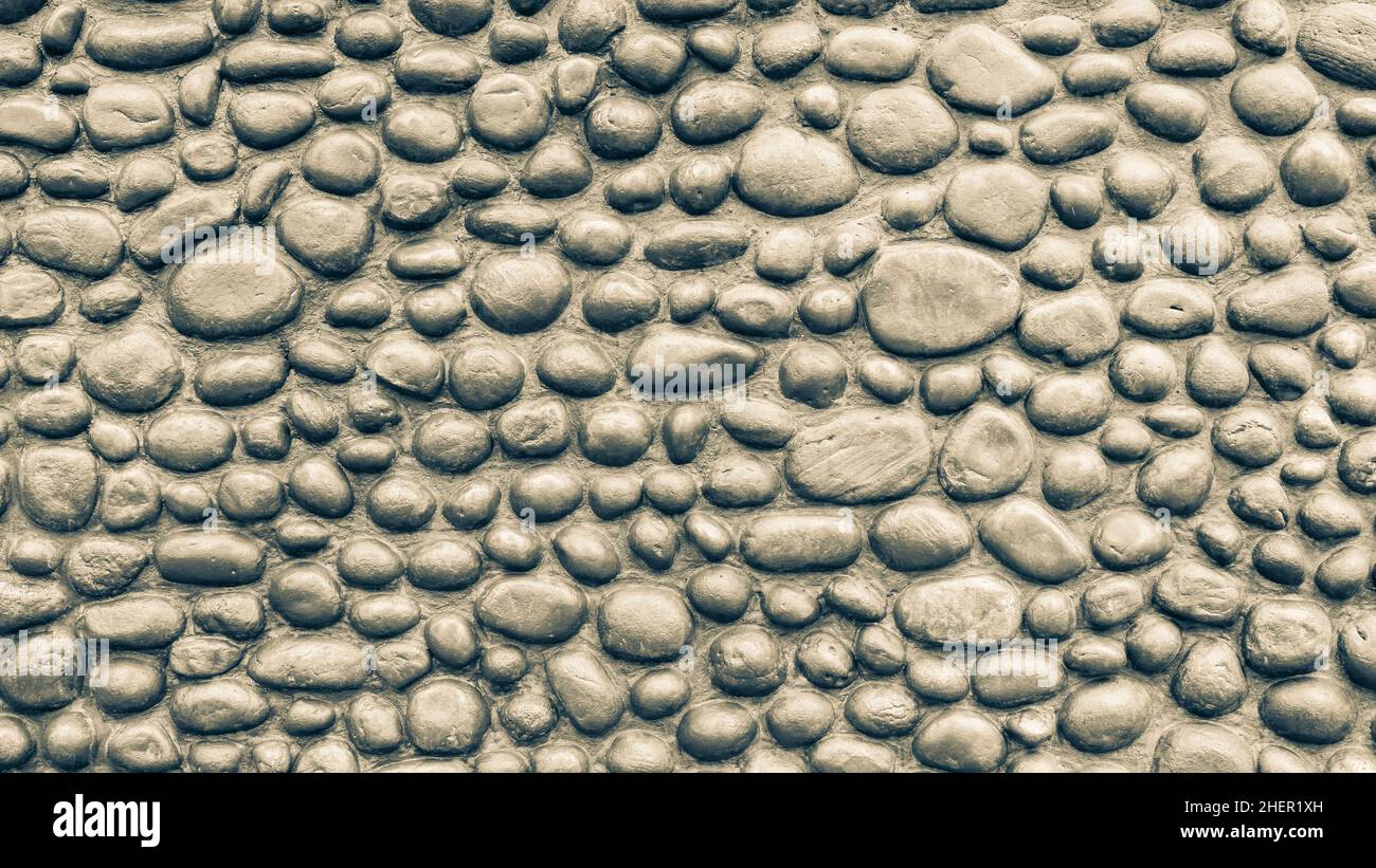 Wall decor design construction of round river stones shapes and sizes ...