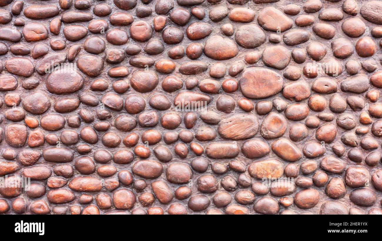 Wall decor design construction of round river stones shapes and sizes ...