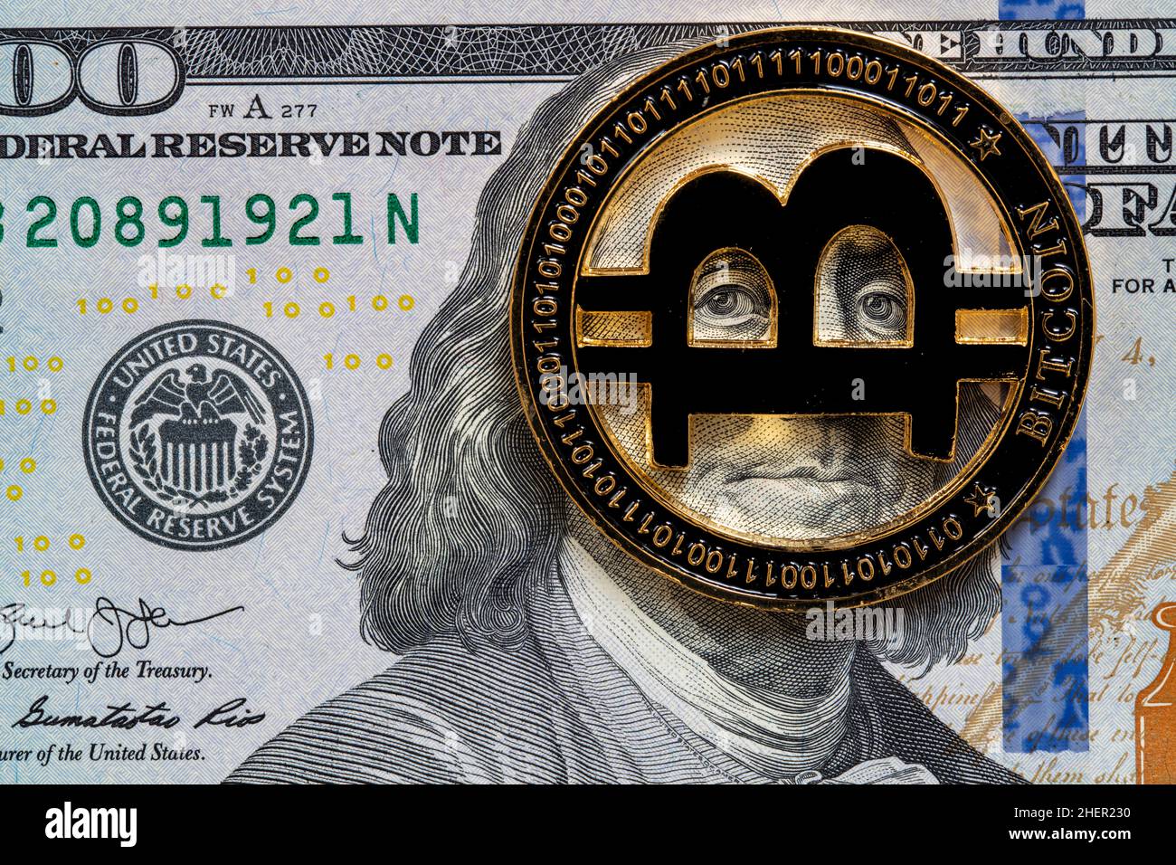 Bitcoin on 100 dollar bill background for design purpose Stock Photo ...