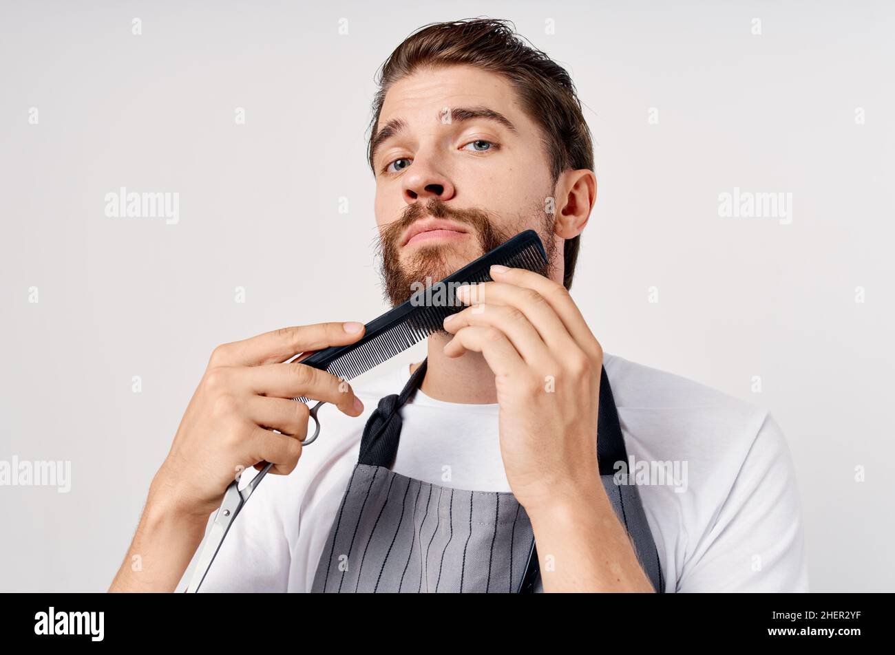 barbershop man gray apron comb scissors professional hairdresser ...