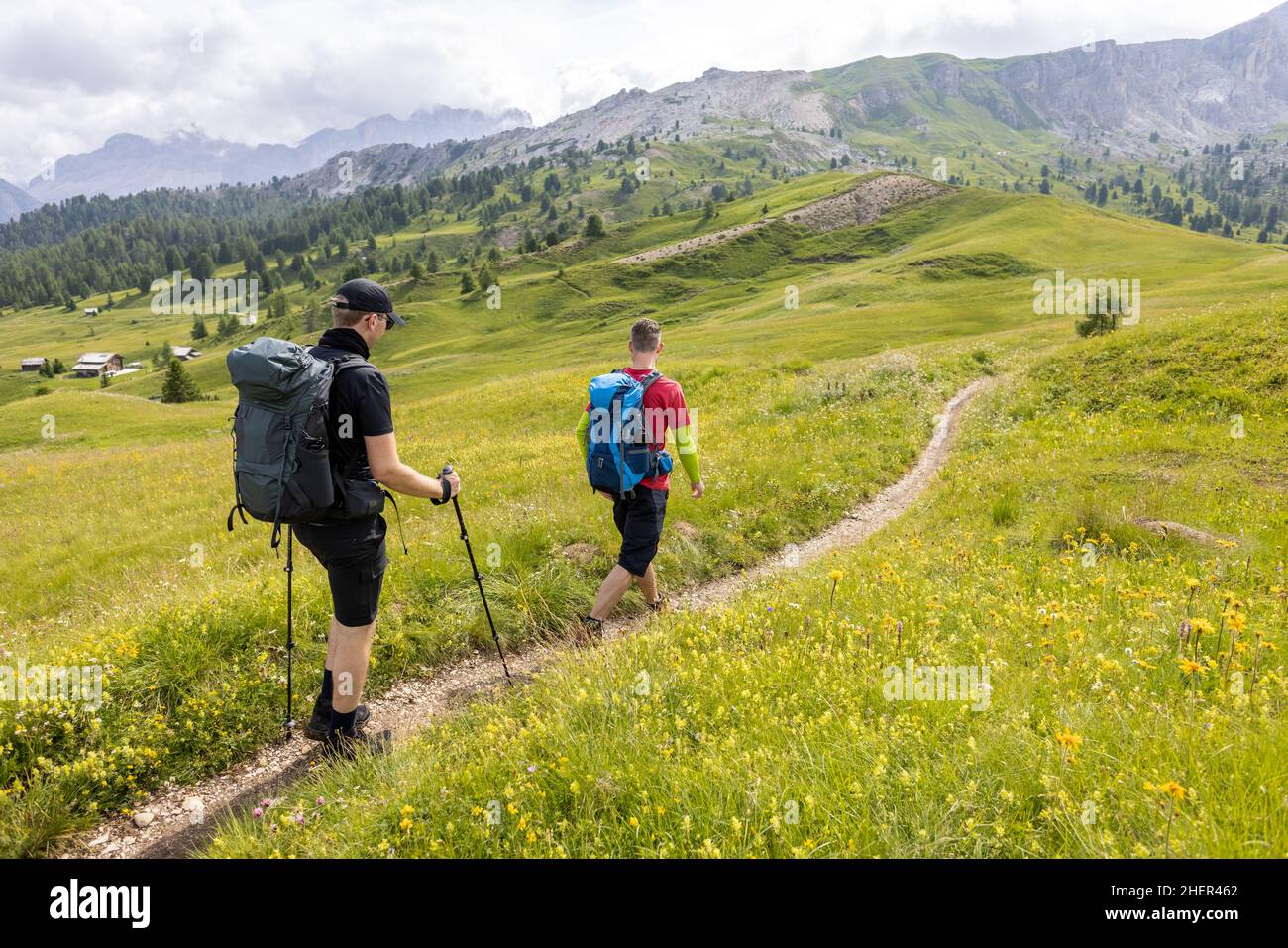 Two hikers on a hiking trail in the Dolomite Alps Stock Photo - Alamy