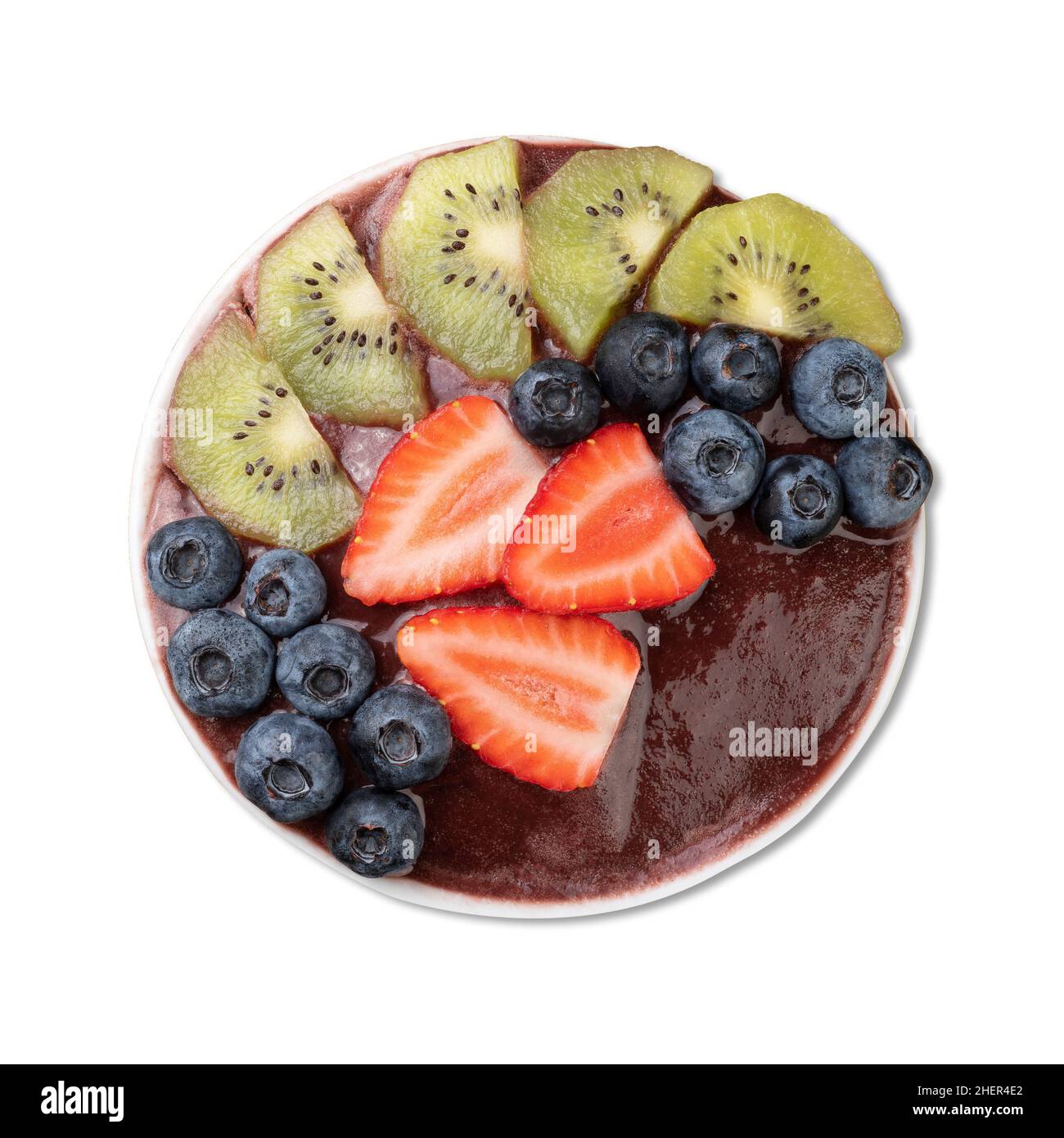 Brazilian typical acai bowl with fruits and muesli isolated over white ...