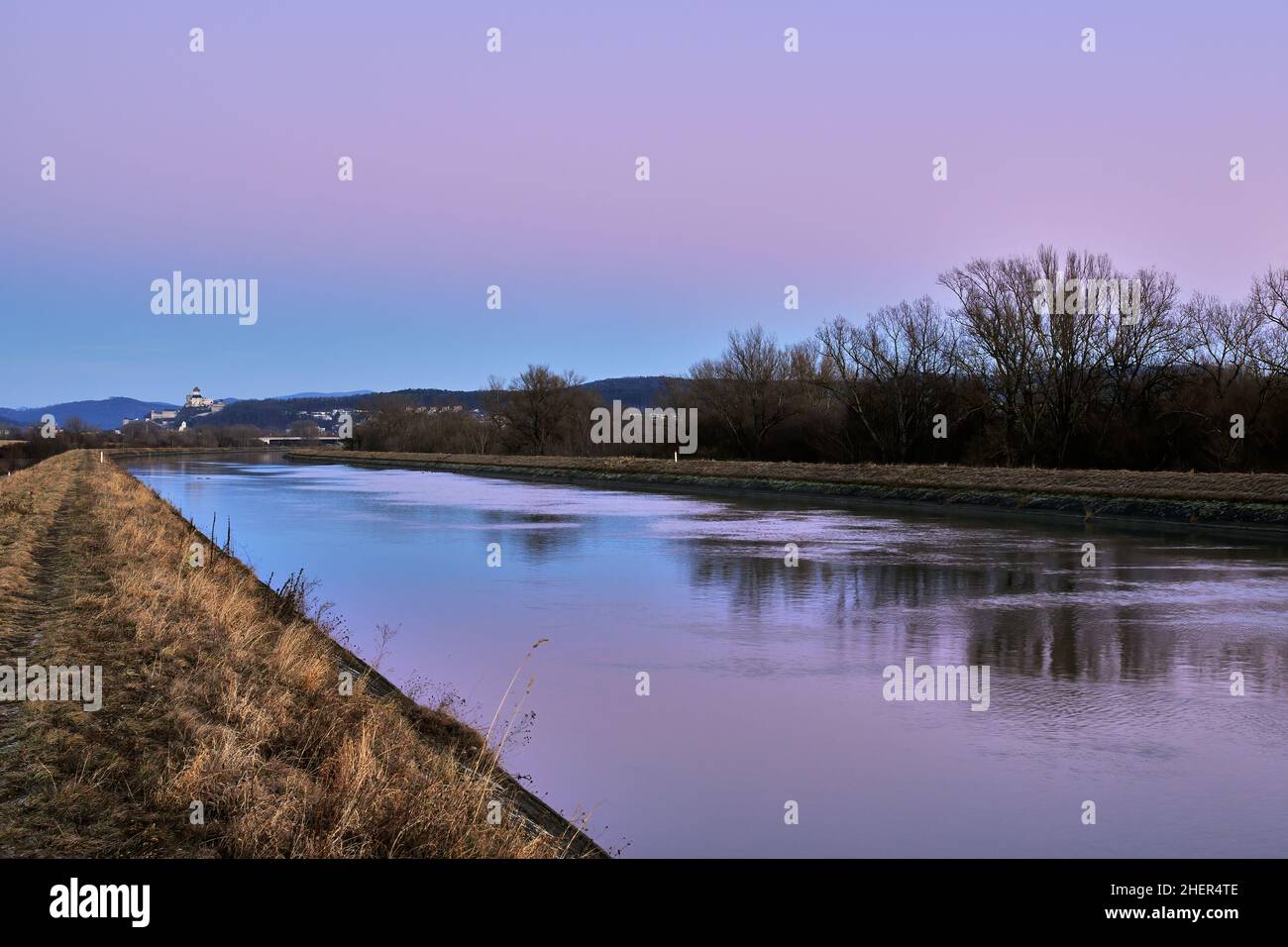 Early evening landscape with waterway at sunset. Beautiful colored sky ...