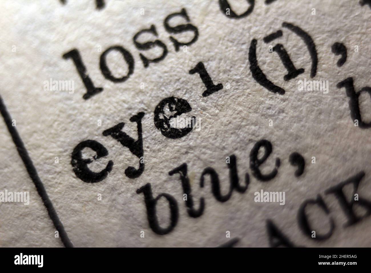 Word eye printed on dictionary page, macro close-up Stock Photo - Alamy