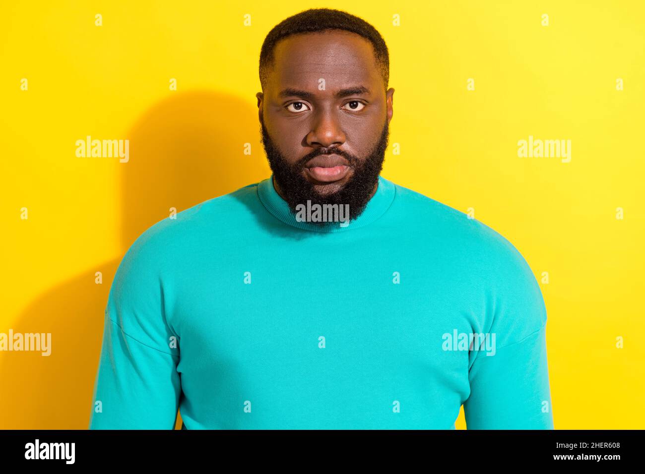 Portrait of calm focused concentrated person look camera wear sweater ...