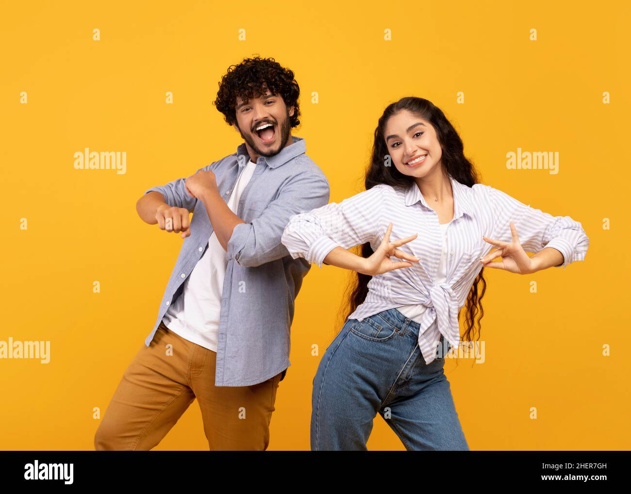 Having Fun Joyful Young Indian Couple Dancing And Fooling Around Enjoying Favorite National 9898