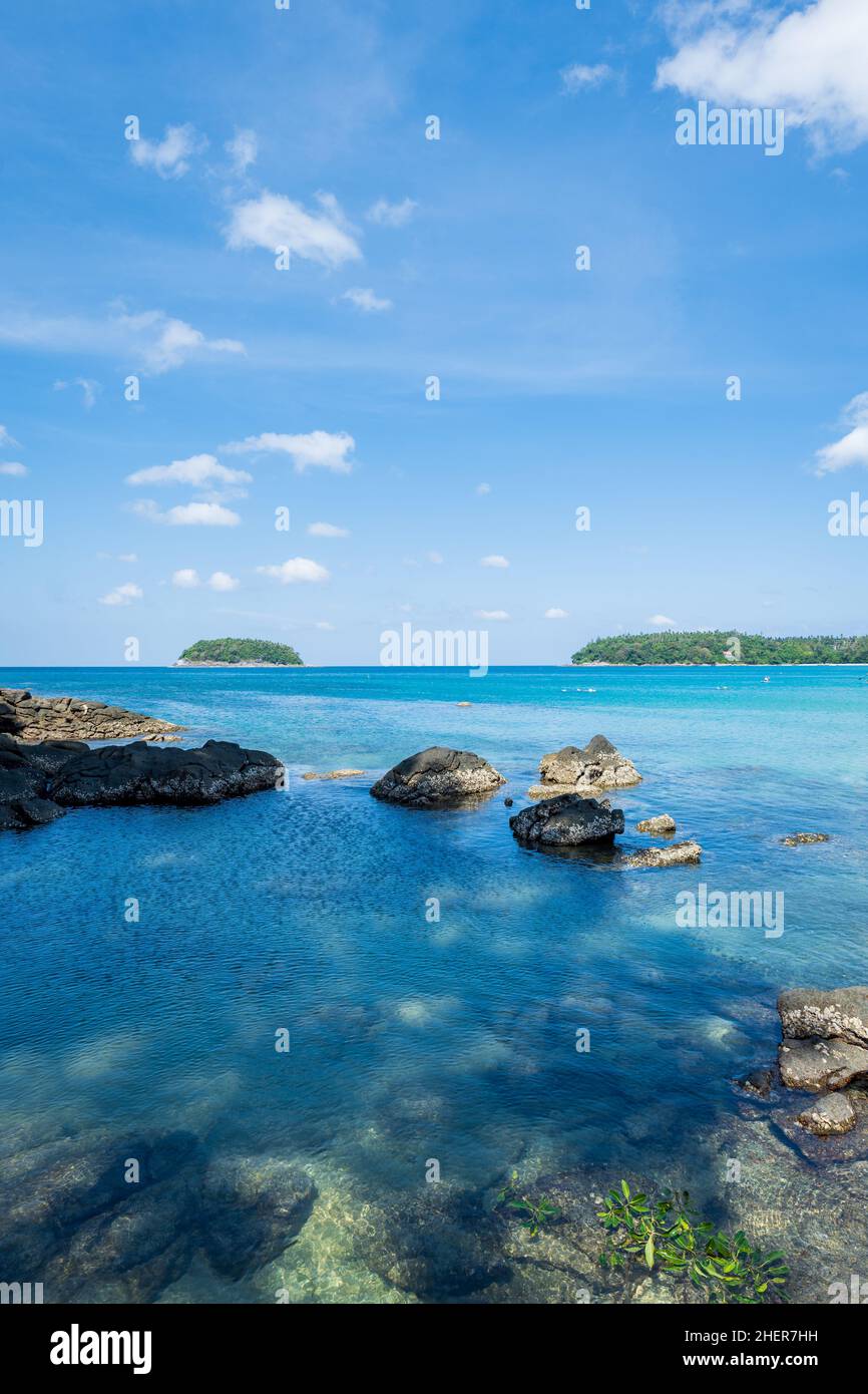Beach with clear water with white and golden sand, blue sky, in ...