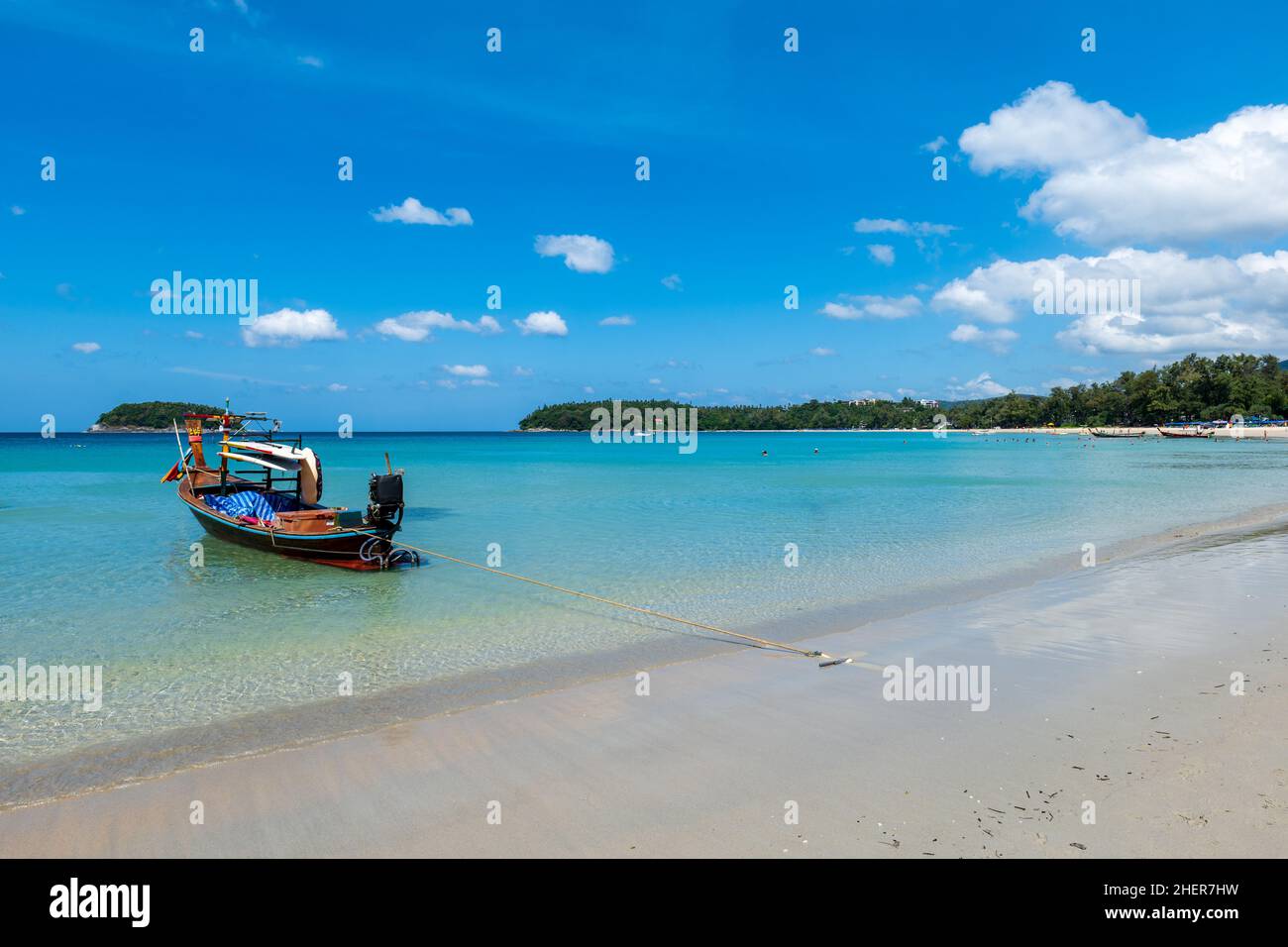 Beach with clear water with white and golden sand, blue sky, in ...