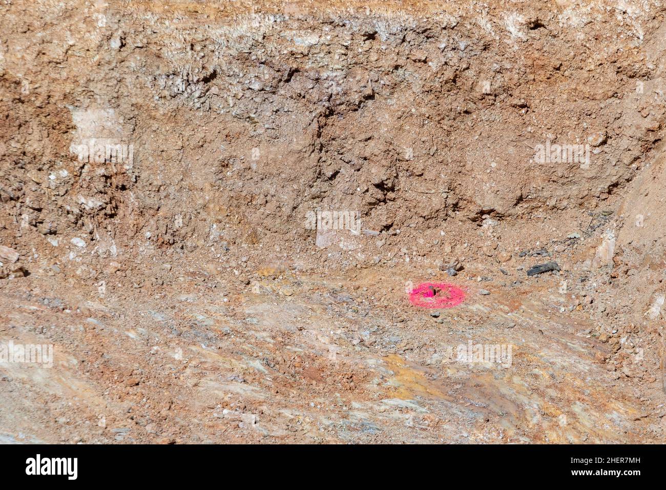 red marked measurement for a batter board in a hole of loam Stock Photo ...