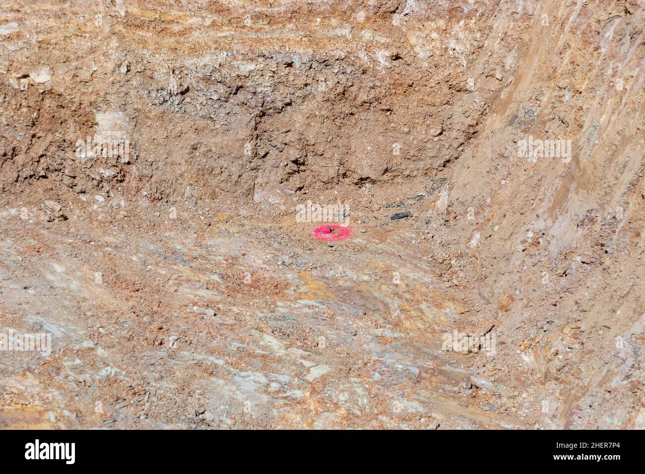 red marked measurement for a batter board in a hole of loam Stock Photo ...