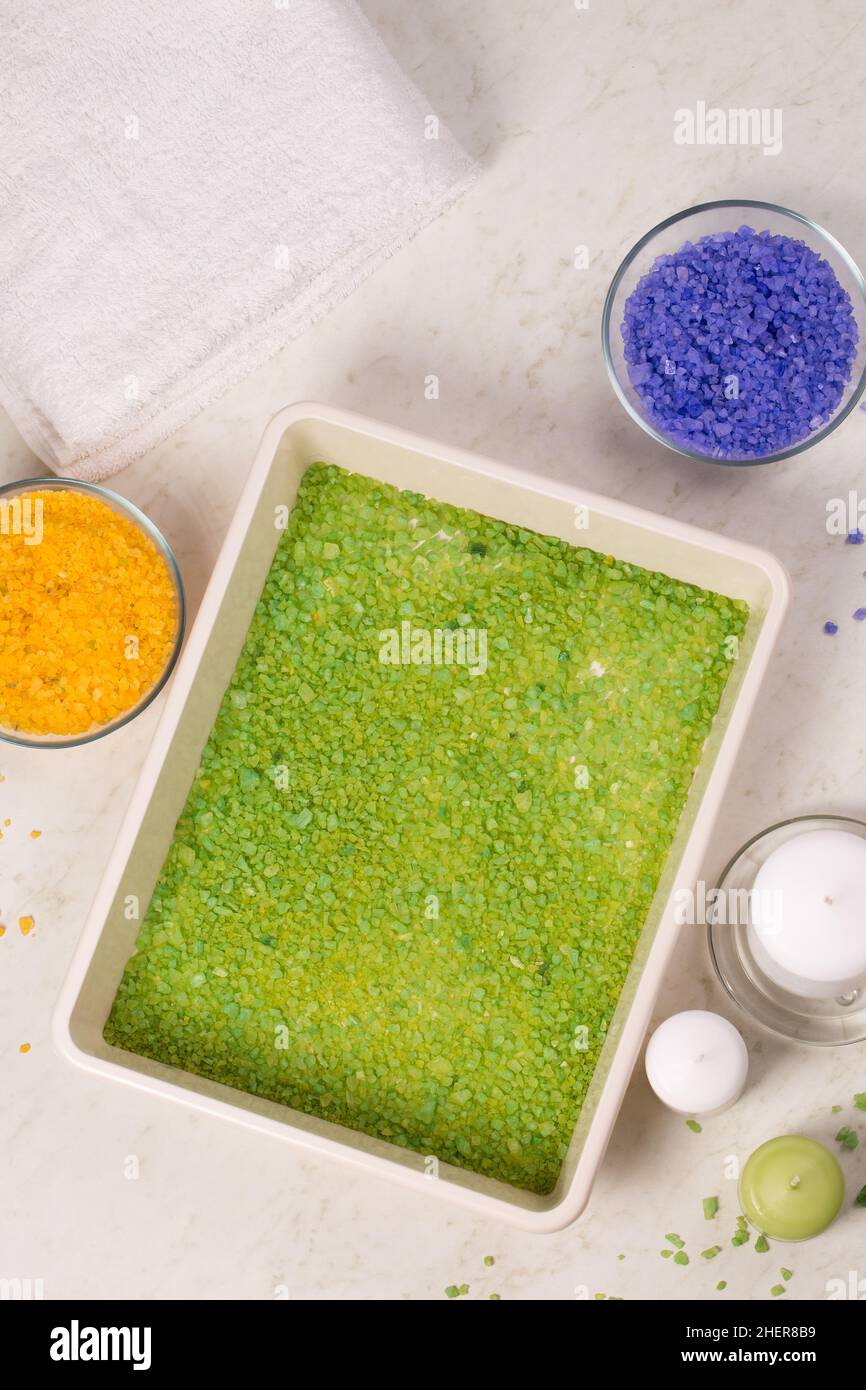 Sea salt for cleaning the feet in the bath Stock Photo - Alamy