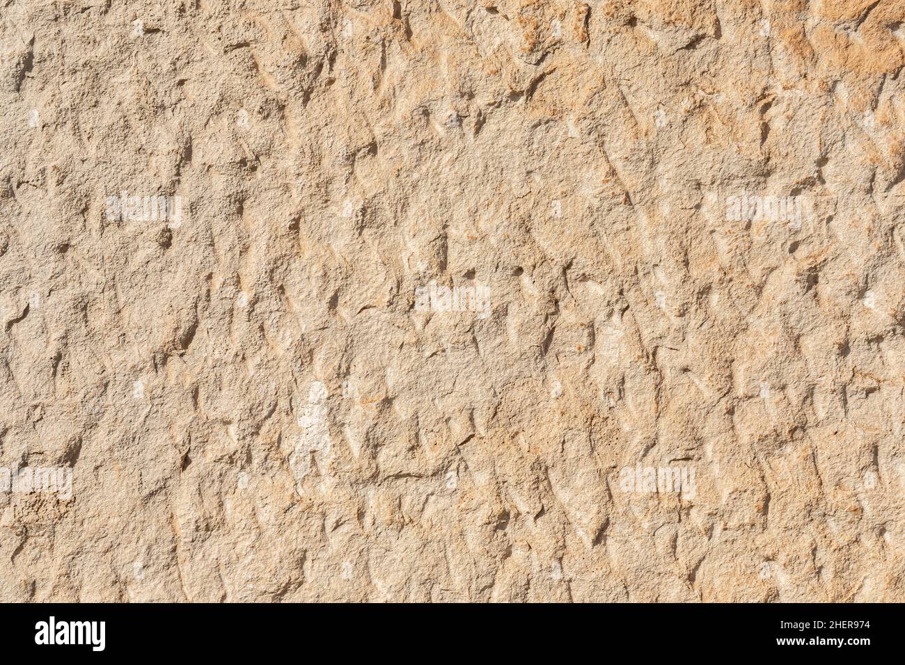 texture of a natural roughly cut stone of some ancient building Stock ...