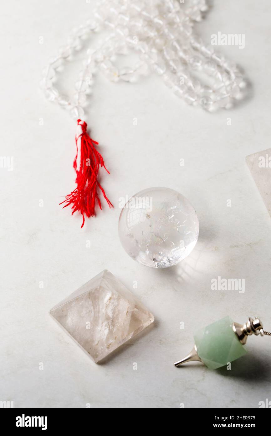 crystal ball, rock crystal pyramid and Pendulum, Reiki concept Stock ...