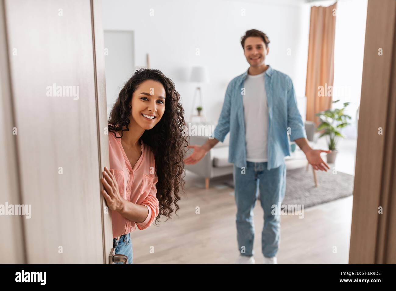Man woman female couple entering front entrance hi-res stock ...