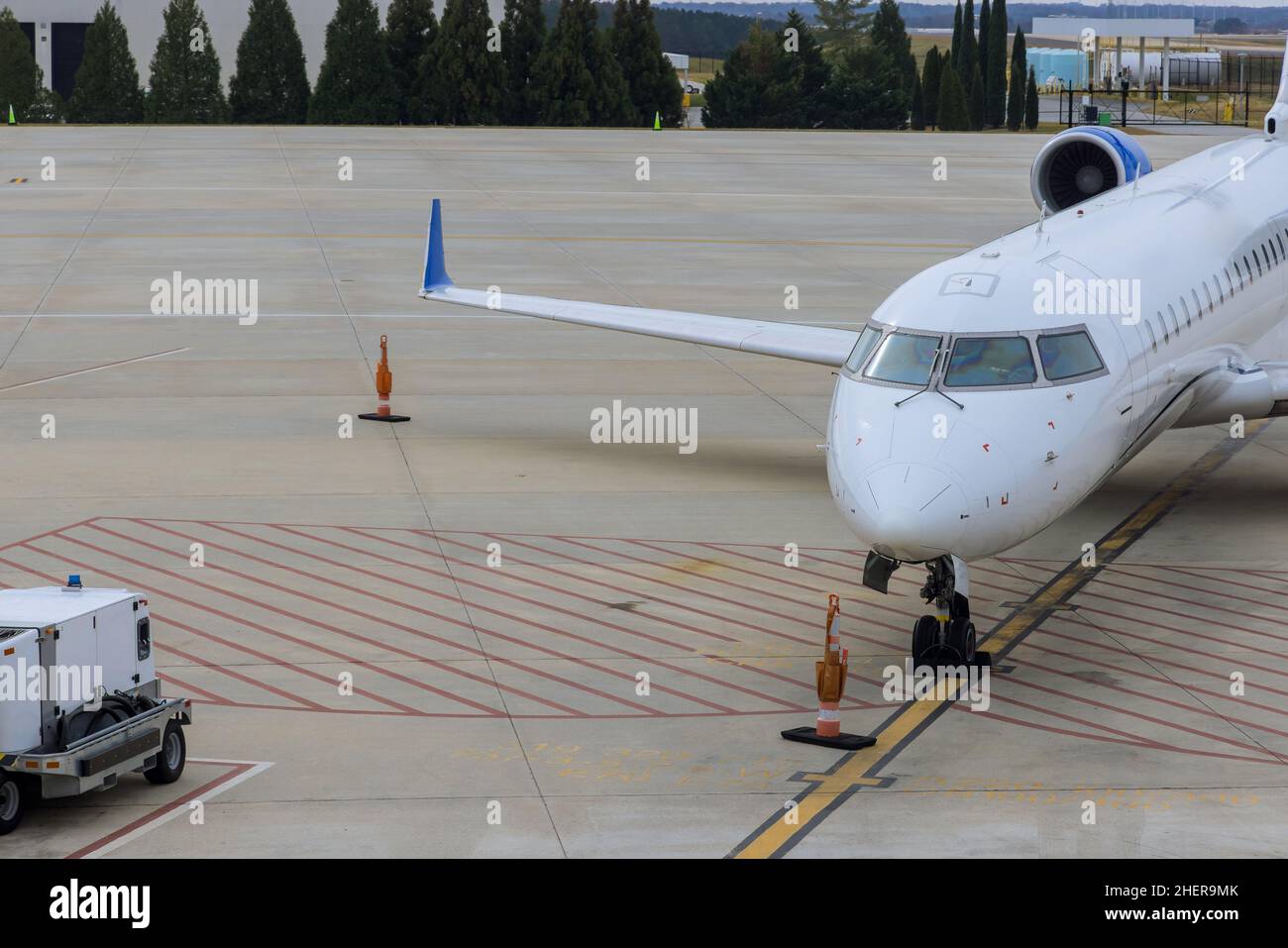 Front view of landed airplane in a terminal of at the John F. Kennedy ...
