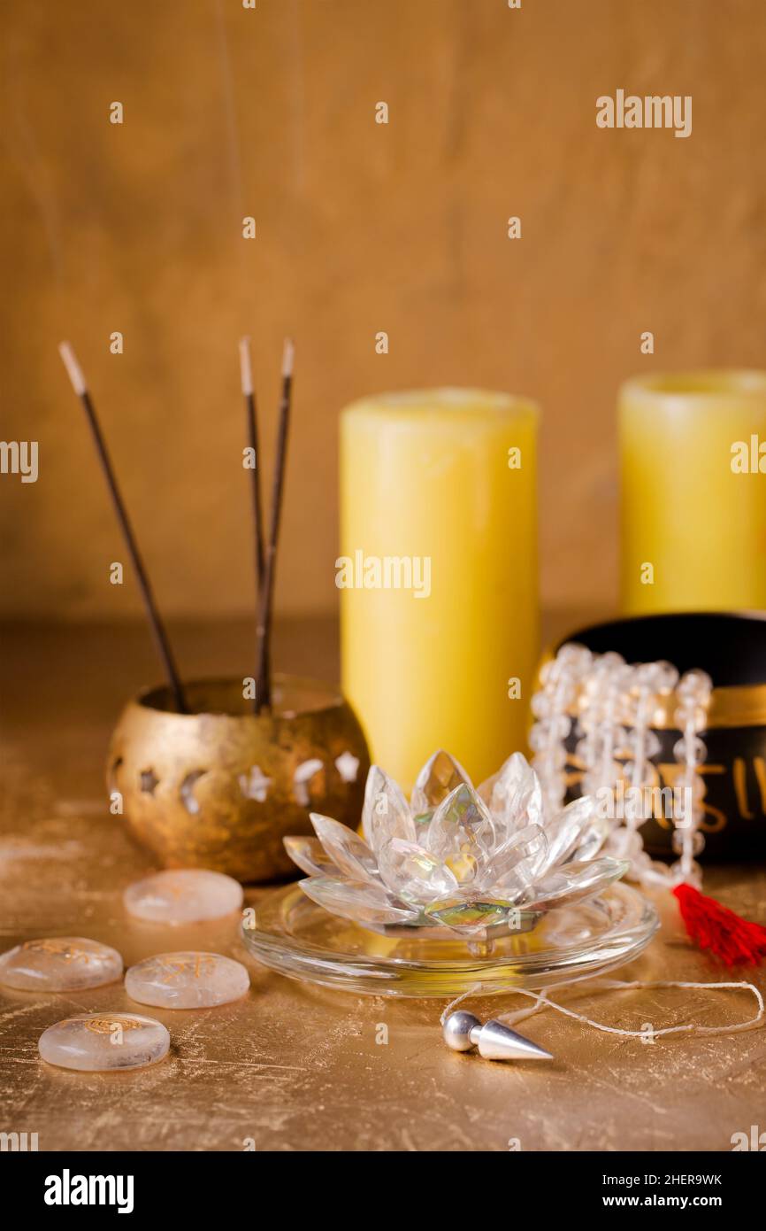 singing bowls and pendulum for healing in reiki flow Stock Photo - Alamy