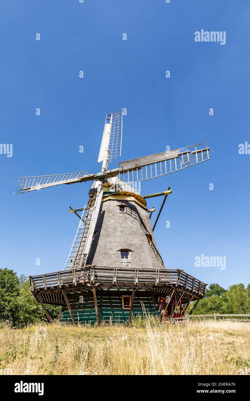 scenic old wind mill in rural landscape Stock Photo - Alamy
