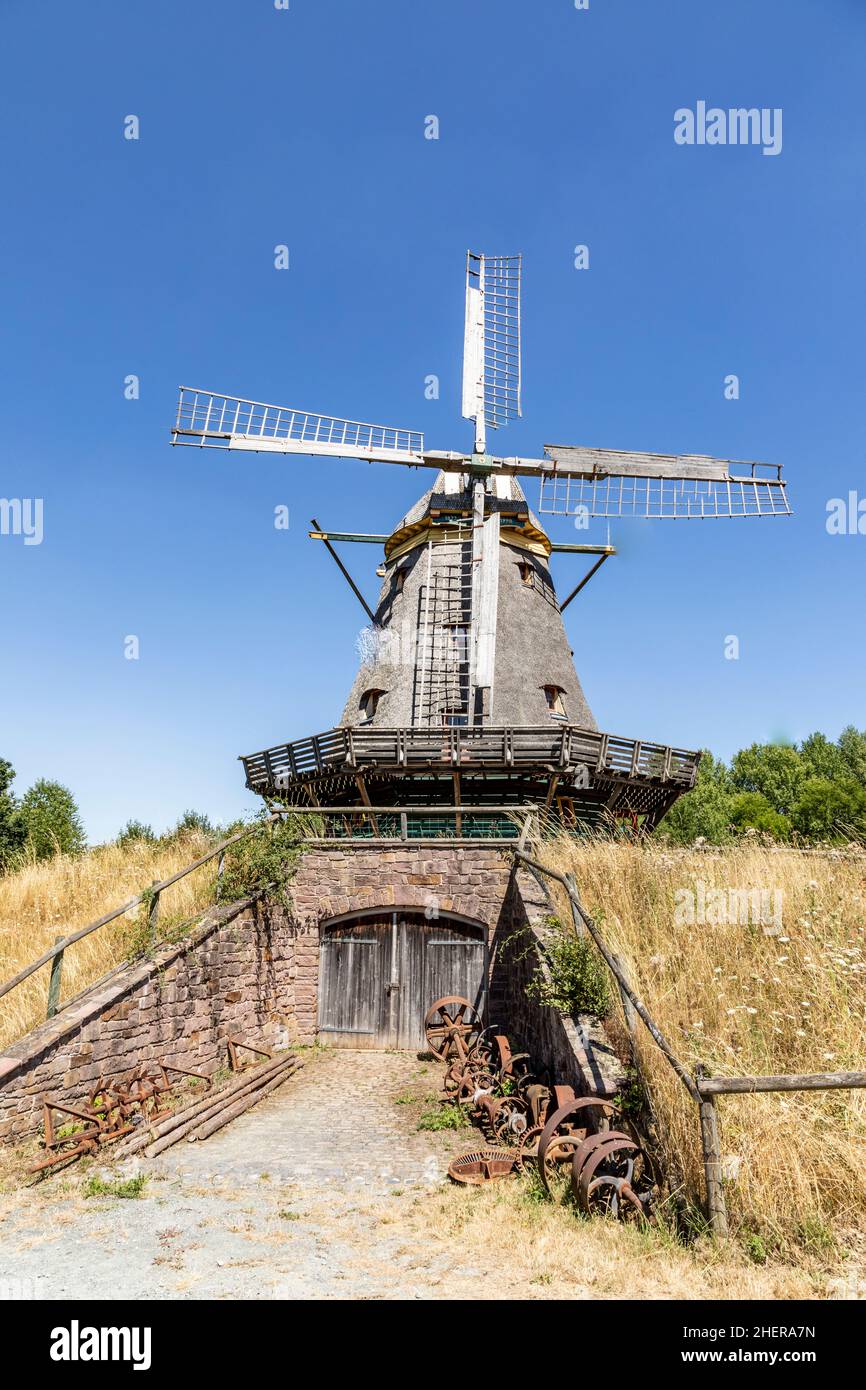 scenic old wind mill in rural landscape Stock Photo - Alamy