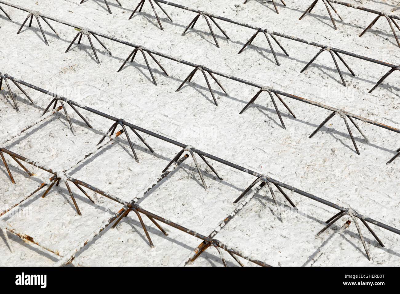 detail of base plate with iron rod in concrete Stock Photo - Alamy