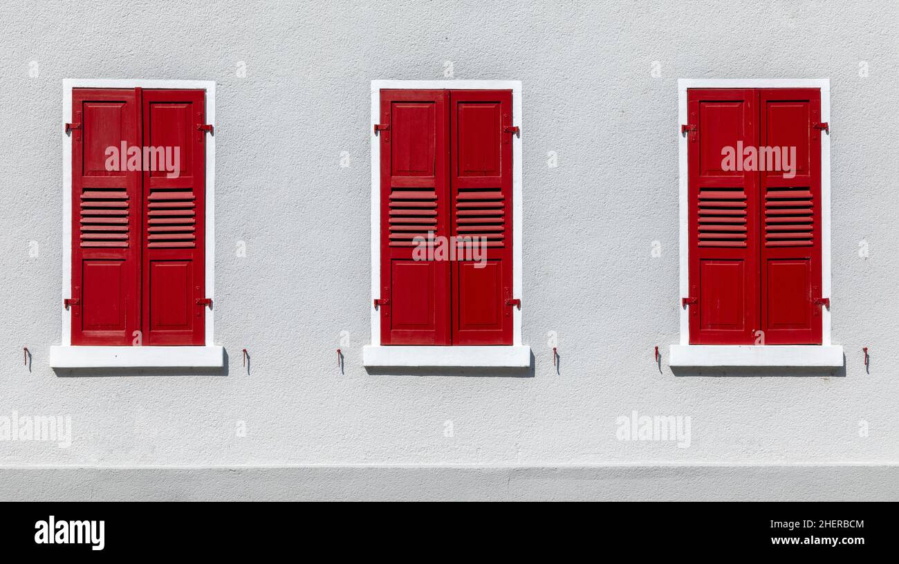 detail of red shutter at white wall Stock Photo - Alamy