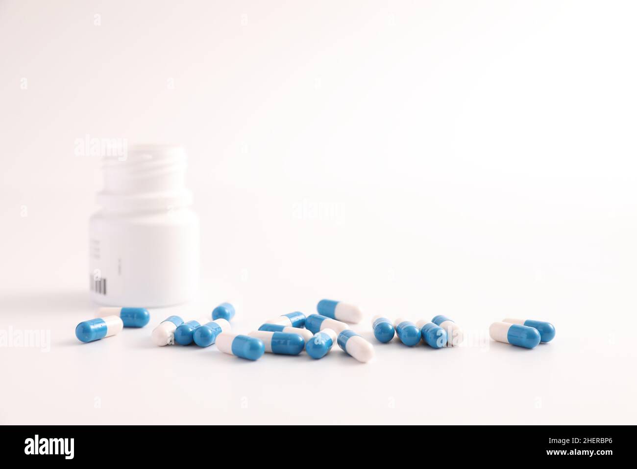 pills capsules close up isolated in white background Stock Photo - Alamy