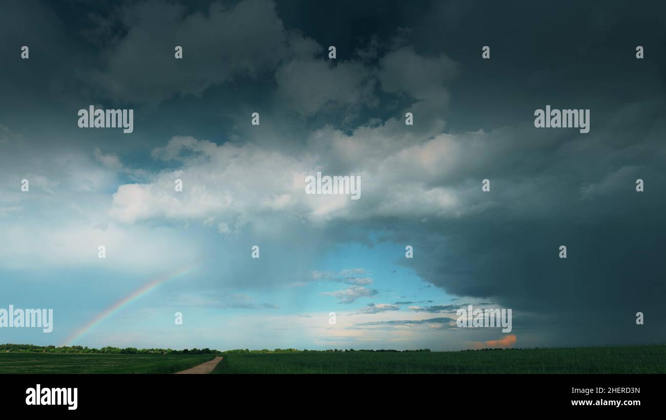 Summer spring rain rainbow above hi-res stock photography and images ...